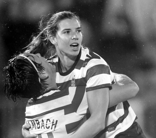 Tobin Heath getting hugged by Abby Wambach – We Don't Walk Slow